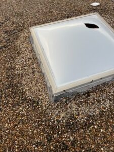 3 Alarming Signs of Commercial Skylight Hail Damage - DFW Roofing Pro